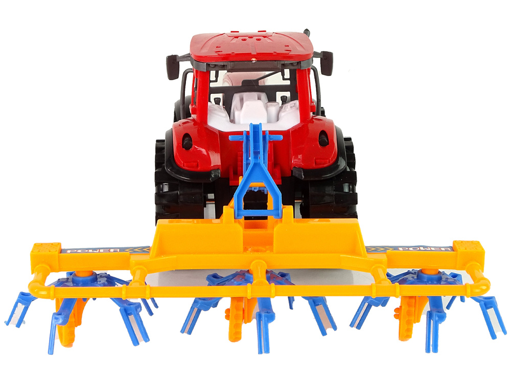 Red Tractor with Rake Friction Drive | Toys \ Tractors