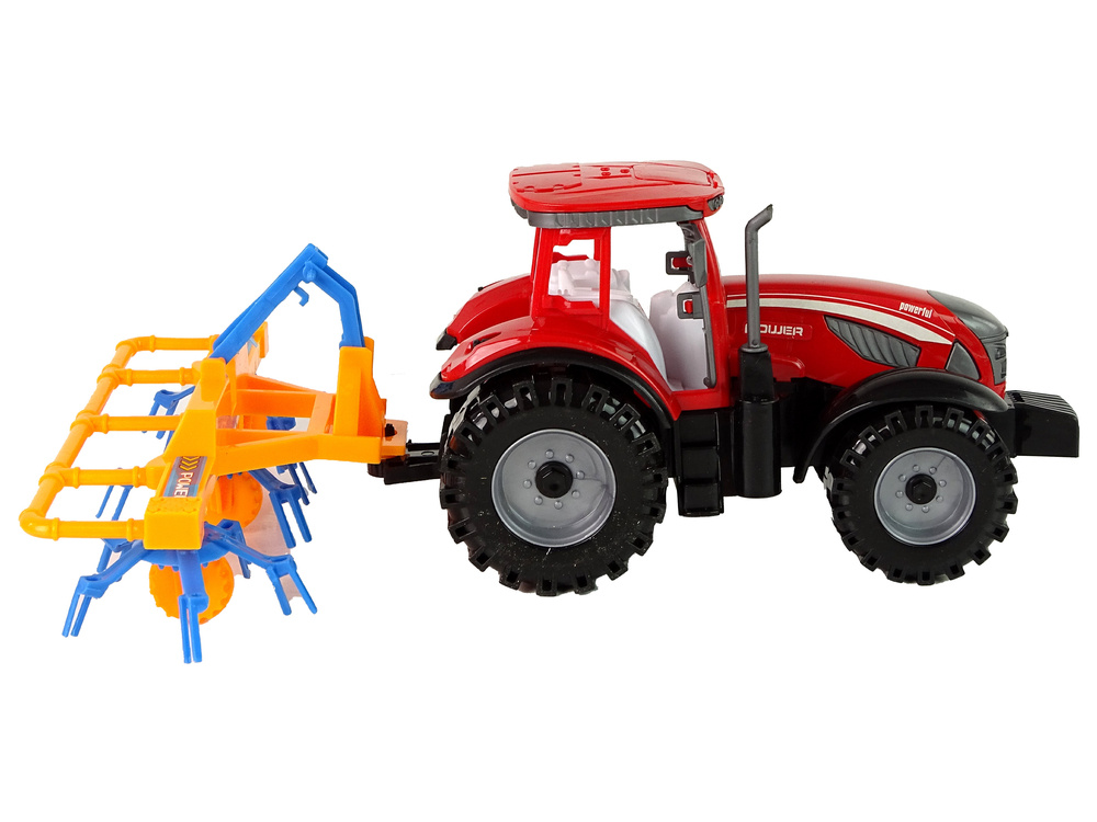 Red Tractor with Rake Friction Drive | Toys \ Tractors
